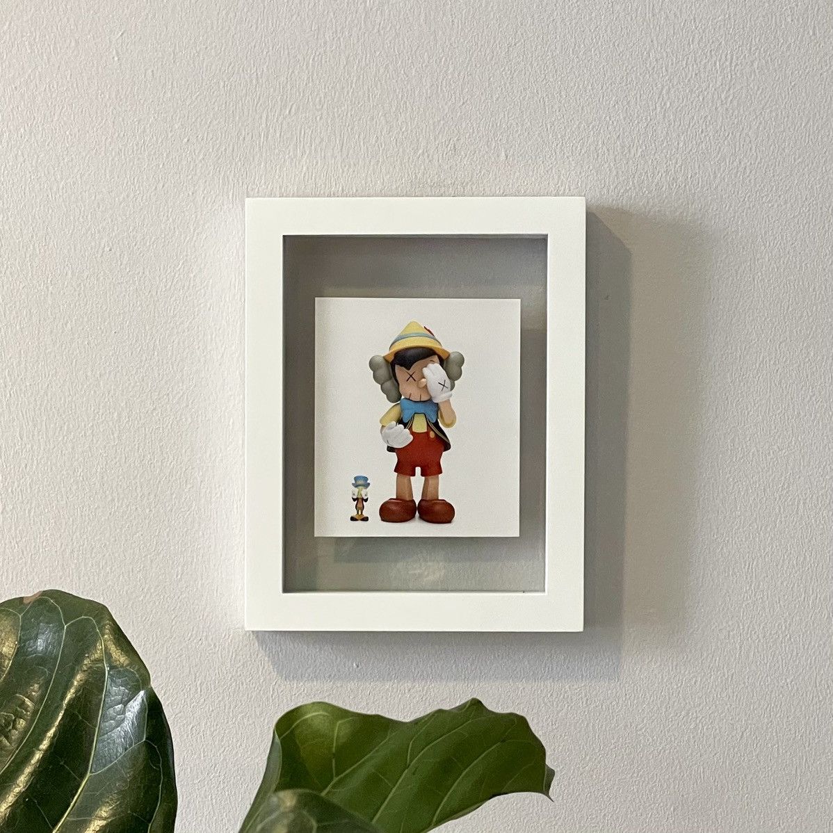 Disney × Kaws Kaws Pinocchio & Jiminy Cricket Vinyl Figure Poster | Grailed