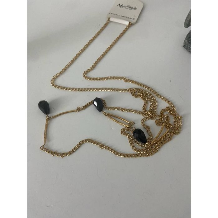 Generic Layered gold tone chain necklace with black teardrop beads ...