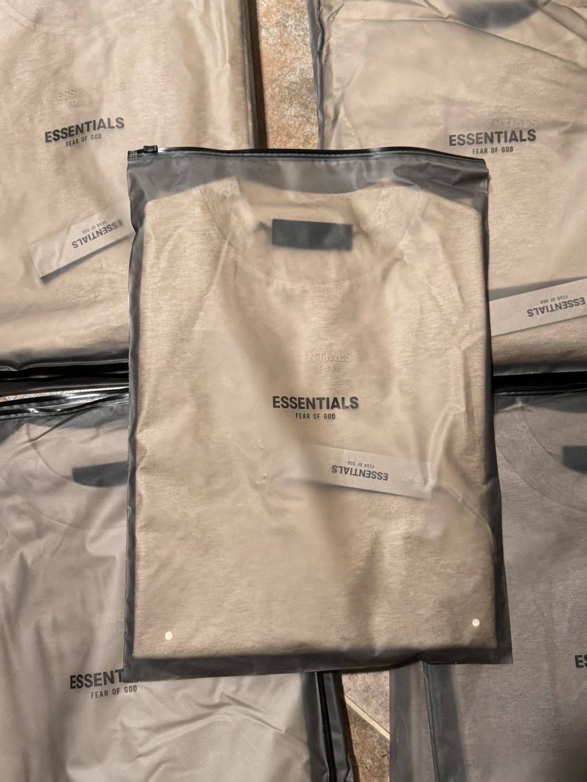 Fear of God Fear Of God Essentials “Gold Heather” t shirt | Grailed