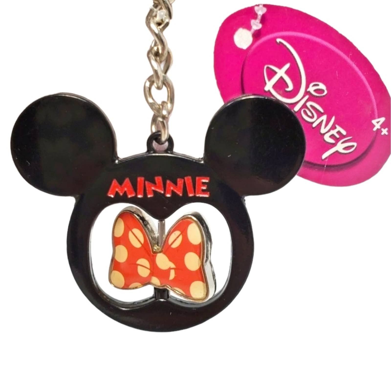 Disney Spinning Fun with Disney's Minnie Mouse Keychain! | Grailed