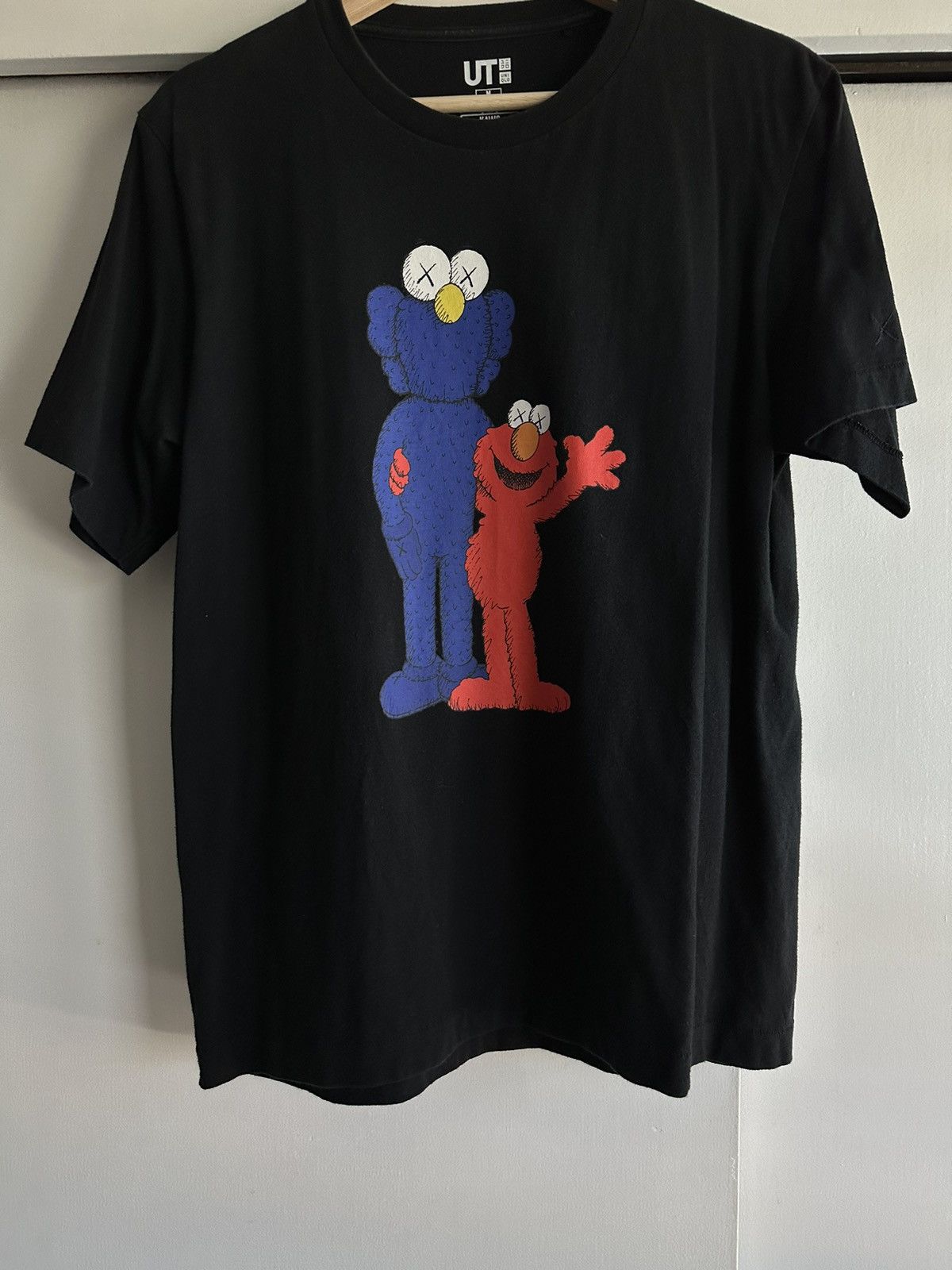 Kaws × Uniqlo Kaws Uniqlo Sesame Street Elmo shirt | Grailed