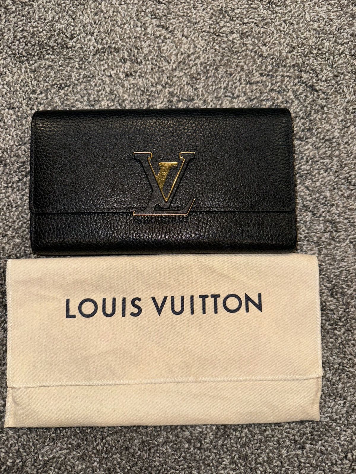 Louis Vuitton Louis Vuitton Black Taurillon Leather Capuchin Wallet | Grailed