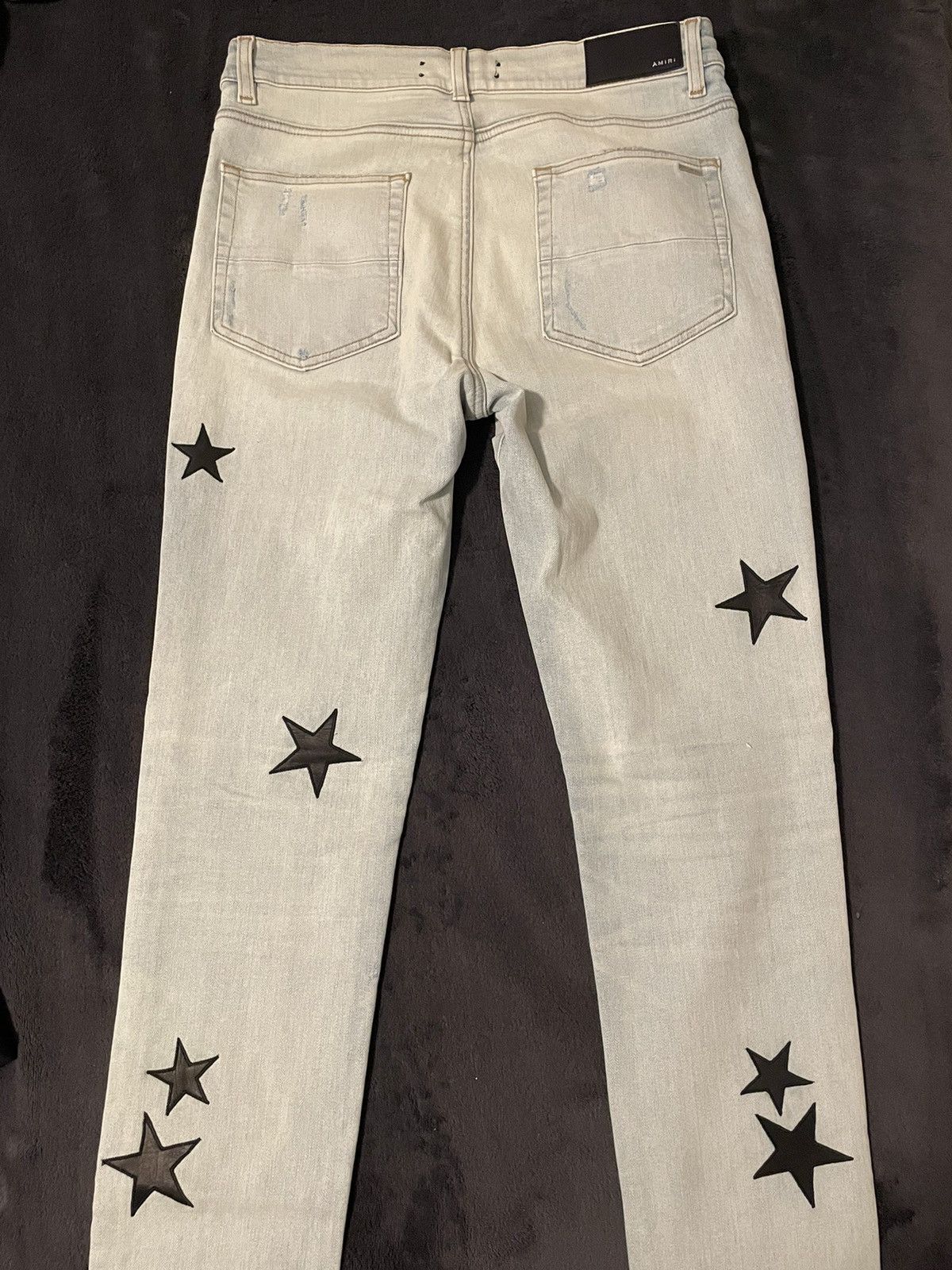 Amiri Amiri Light Wash Leather Star Patch Jeans | Grailed
