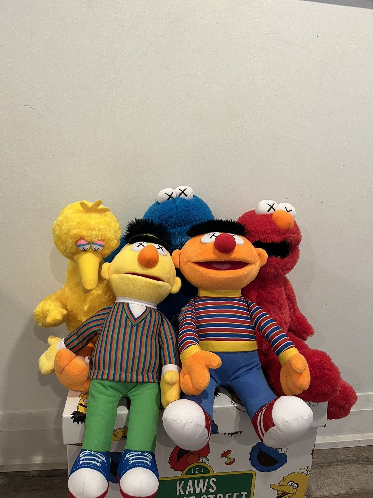 Kaws × Uniqlo Kaws x Uniqlo x Sesame Street plush box set | Grailed