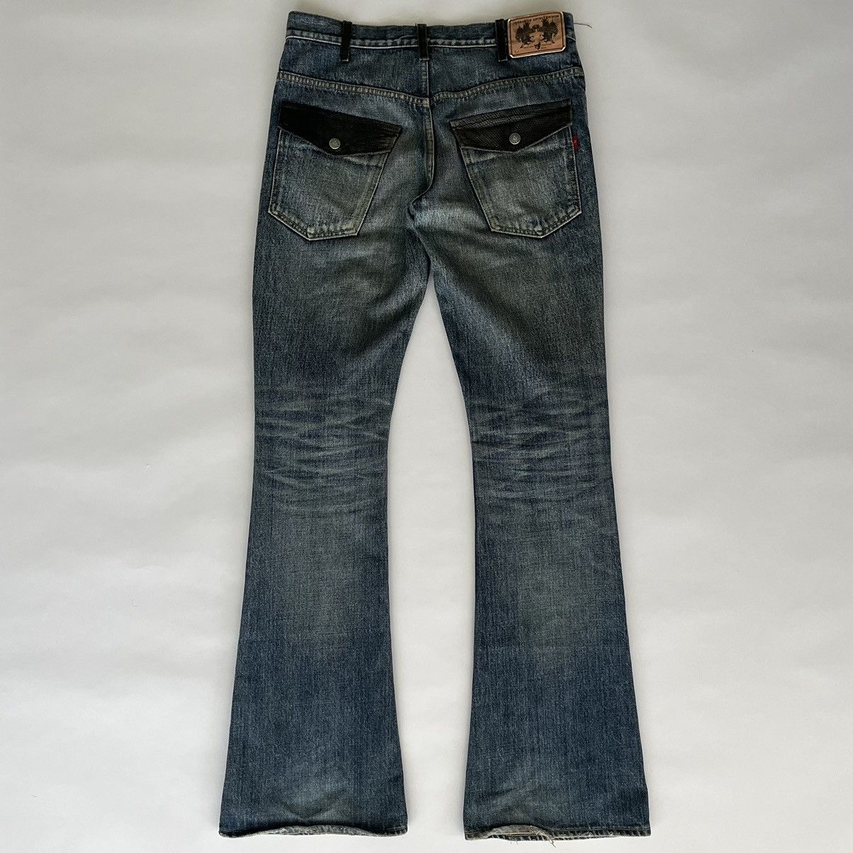 Backbone × Isamu Katayama Backlash Backbone AW09 Flared Lizard Leather Pocket Jeans | Grailed