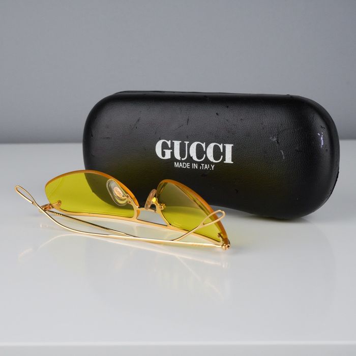 Gucci Vintage 90s gucci logo yellow lenses gold rimless sunglasses ...