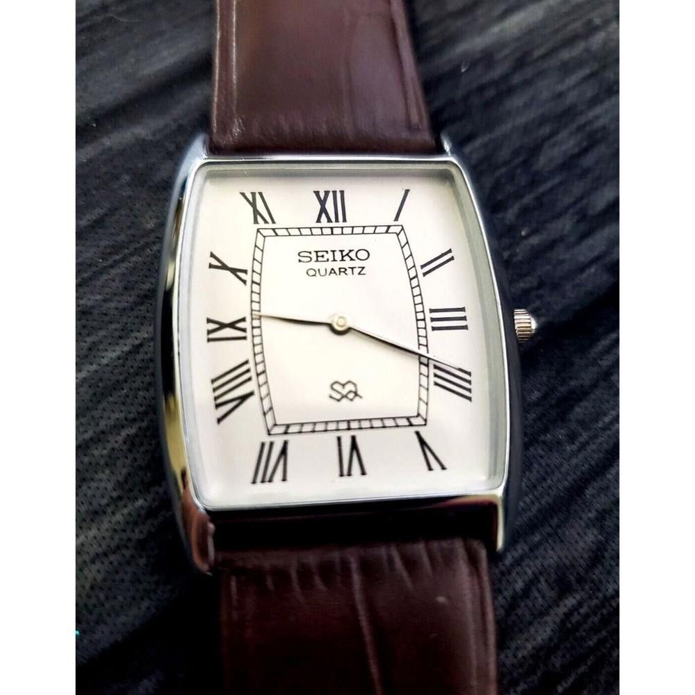 Seiko RARE NOS Seiko Men Barrel Tank White Roman Dial Brown Strap | Grailed
