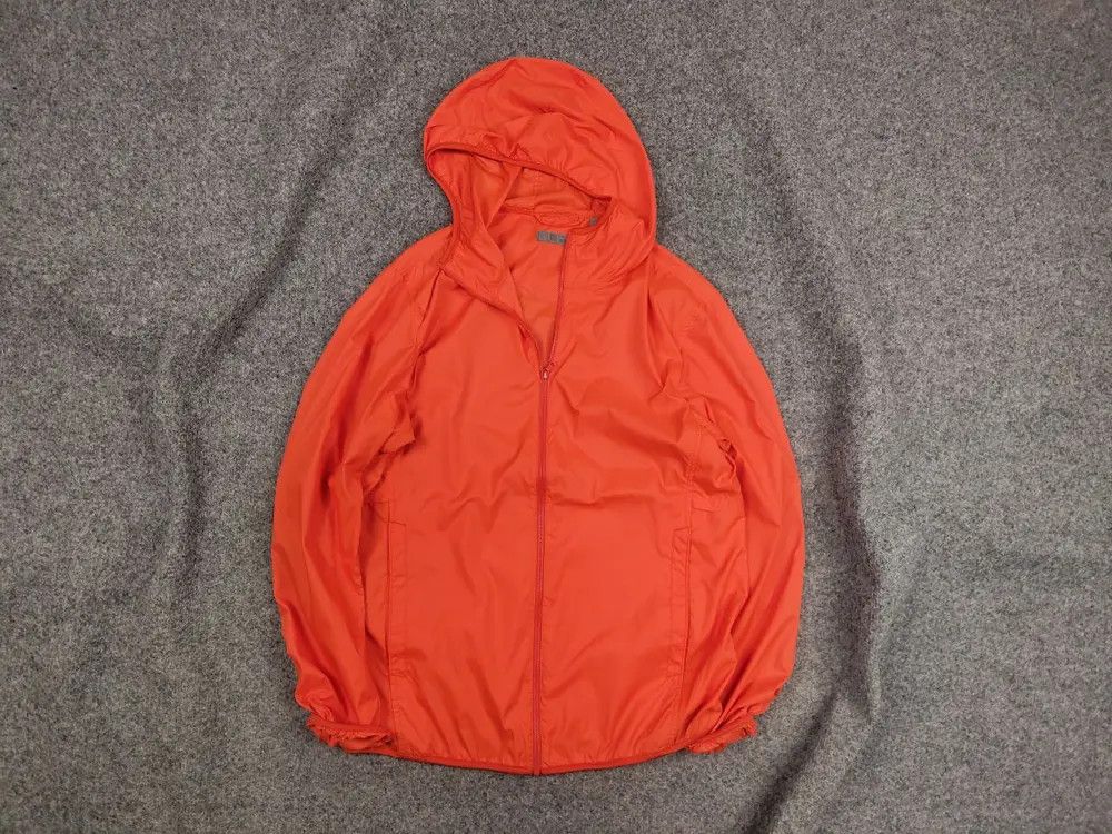 Japanese Brand × Streetwear × Uniqlo Uniqlo Orange Light raincoat ...