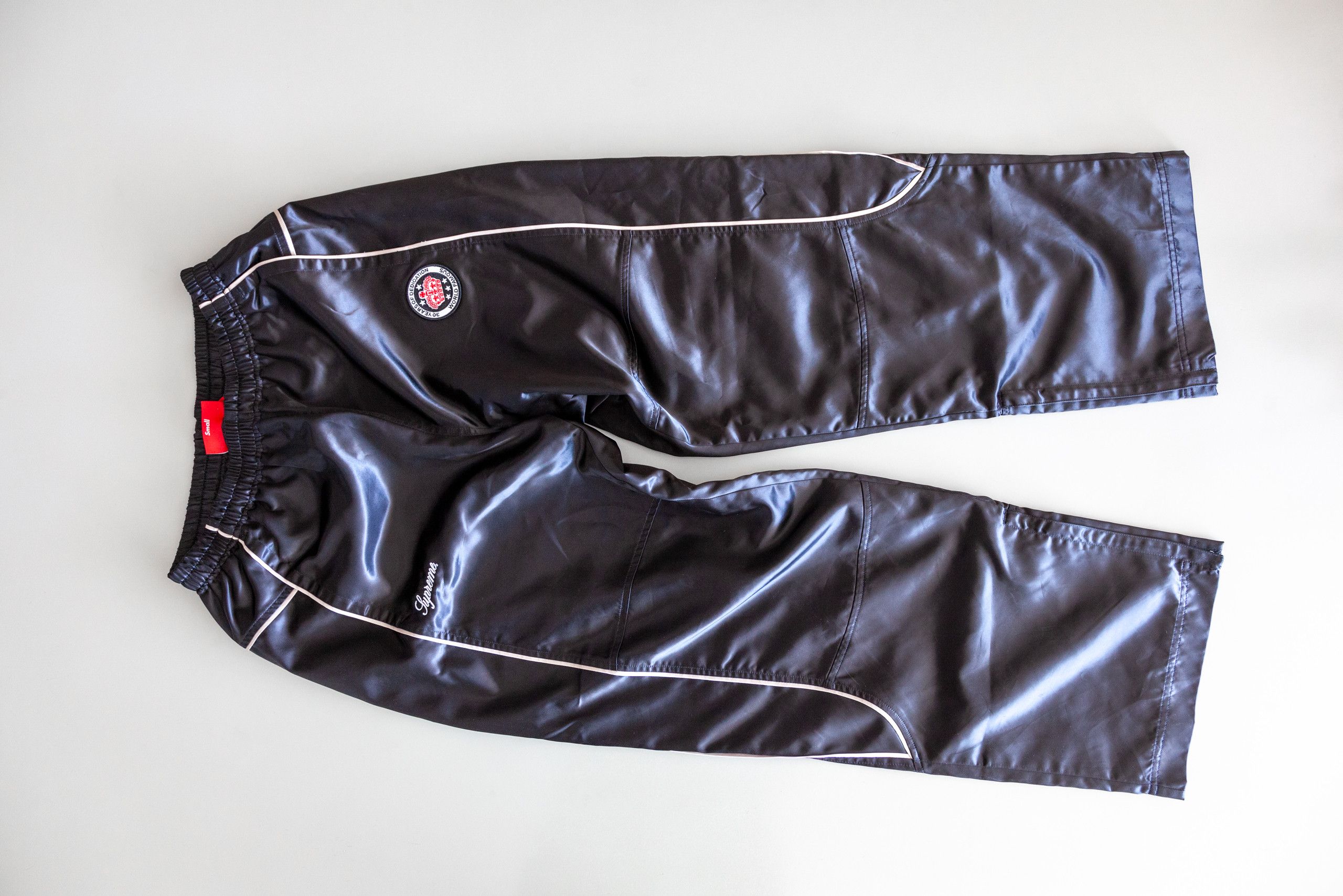 Supreme Supreme - 30 Years of Dedication Satin Track Pants | Grailed