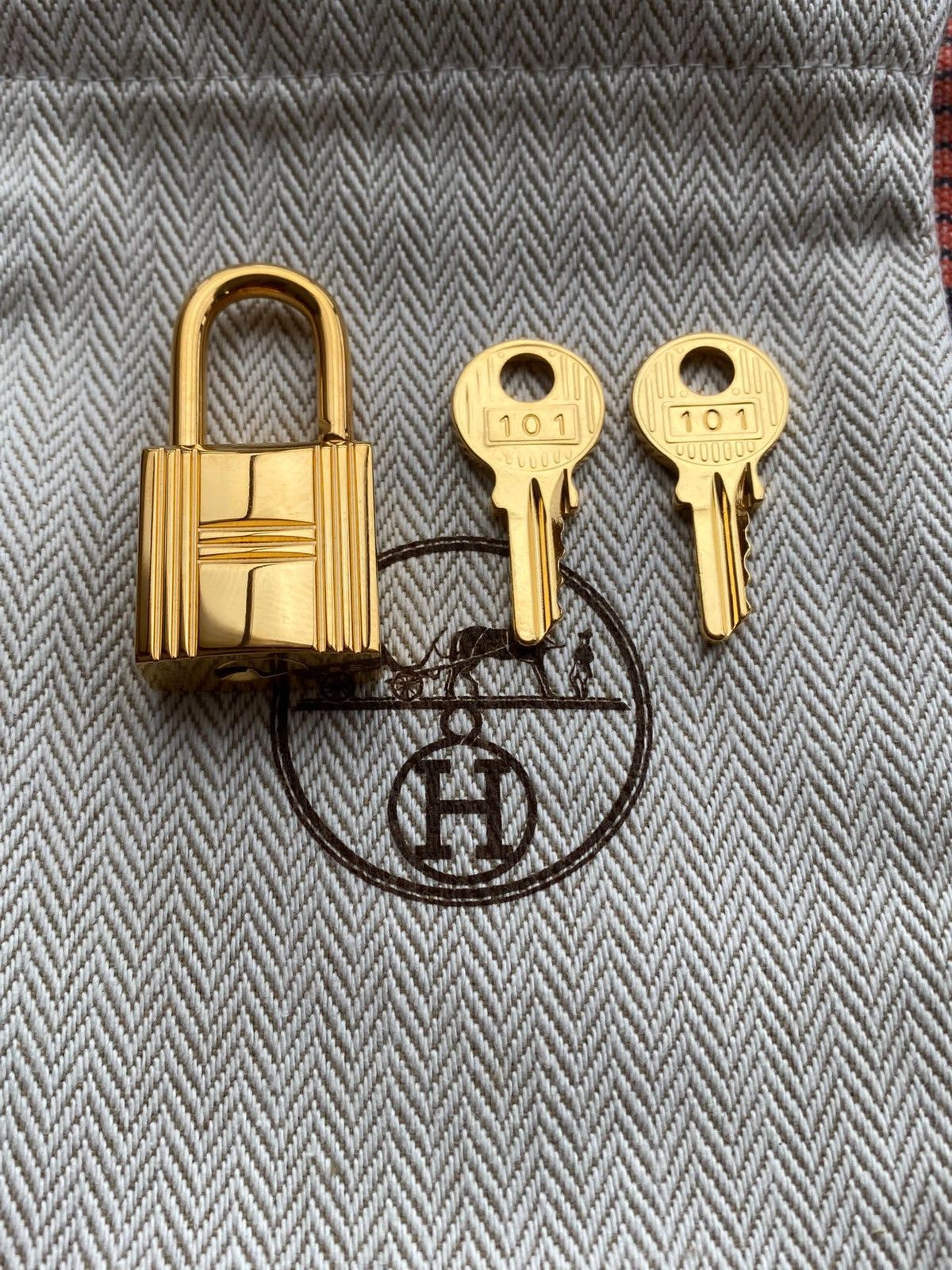 Hermes Authentic Gold plated Hermès padlock with two keys | Grailed