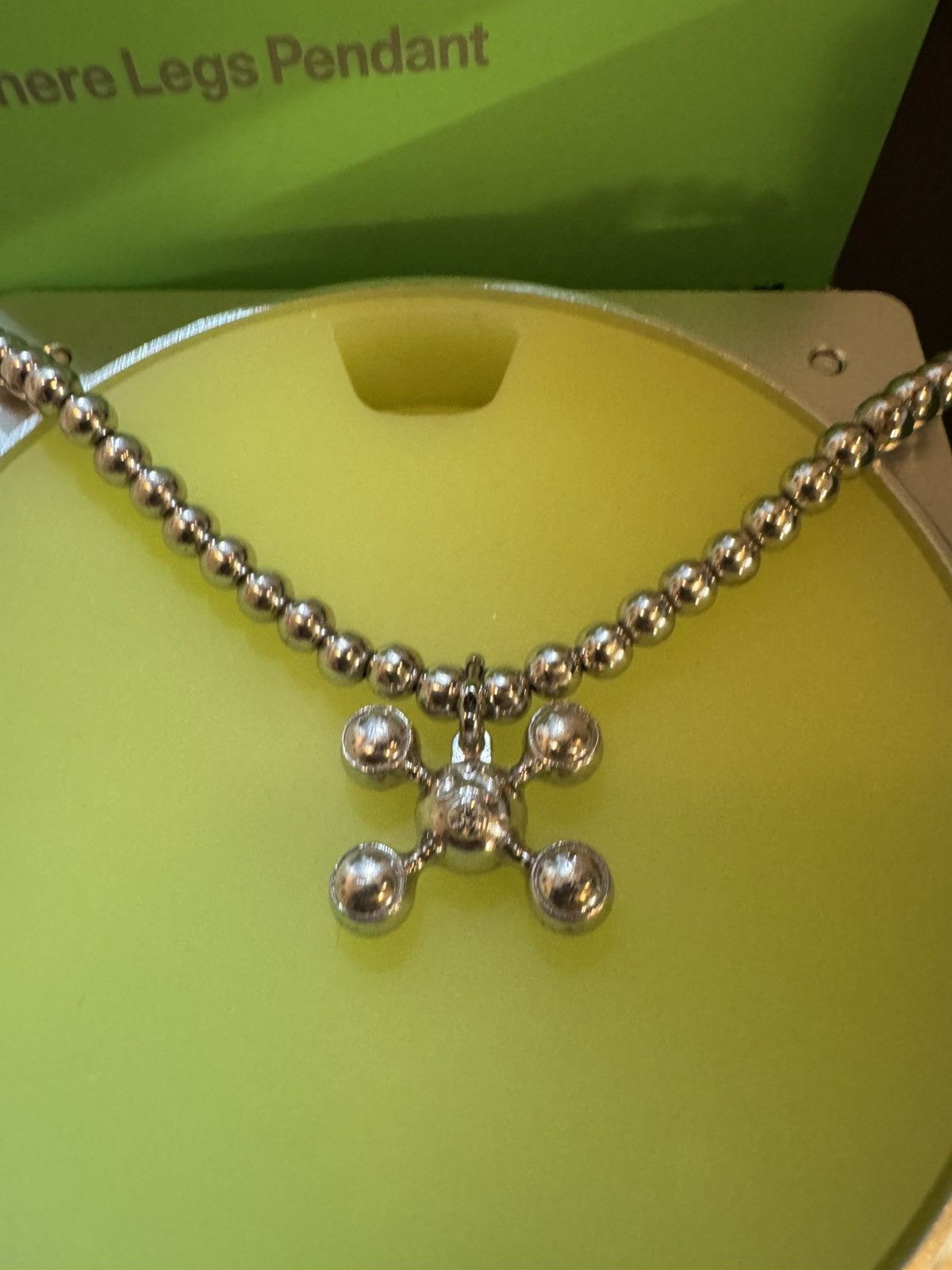 Frank Ocean HOMER sphere legs pendant | Grailed