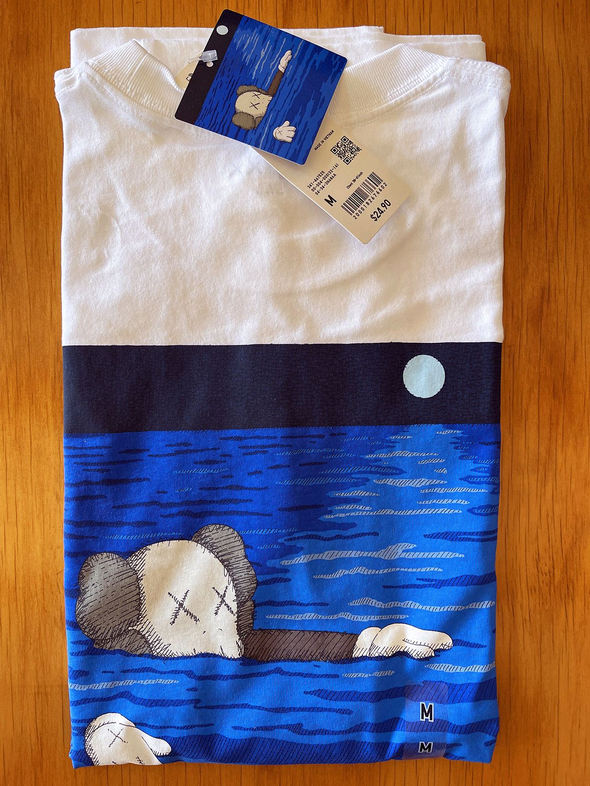 Uniqlo Exclusive KAWS x Uniqlo UT Artbook Cover T-Shirt (New) | Grailed