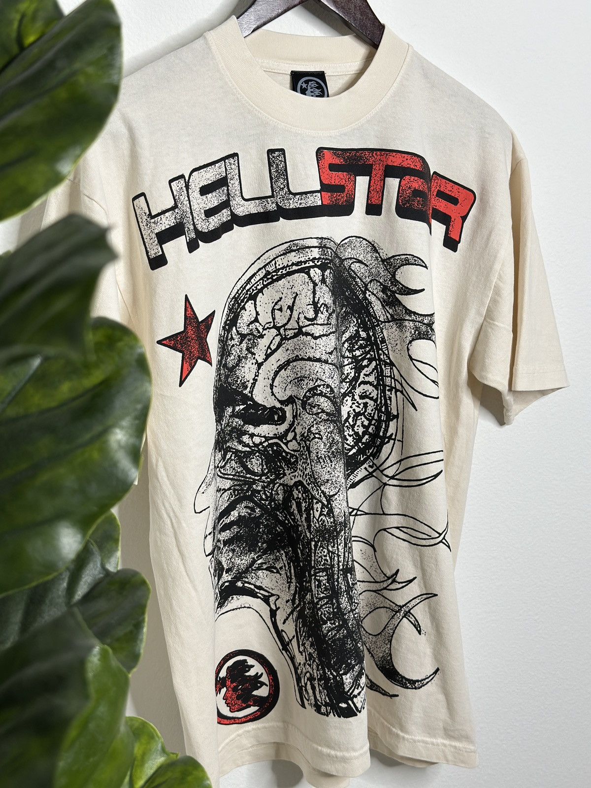 HELLSTAR Hellstar Studios Human Development Tee Cream | Grailed