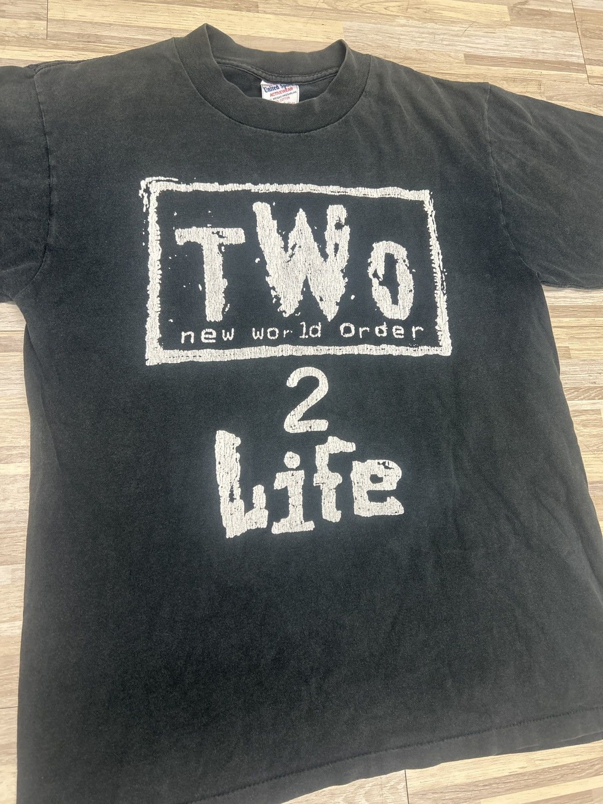 Made In Usa × Streetwear × Vintage 90s NEW WORLD ORDER TEE | Grailed