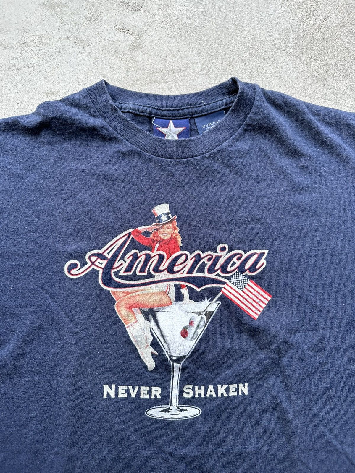 Racing × Streetwear × Vintage Vintage American Never Shaken T Shirt ...