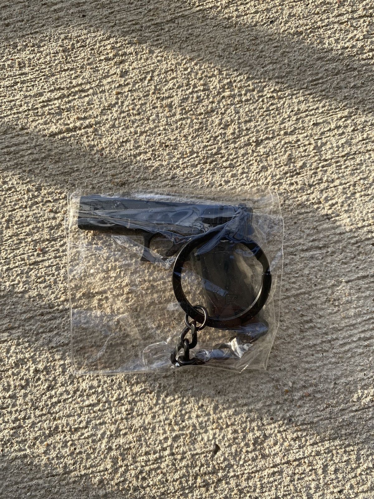 Fuck The Population FTP Pistol Keychain | Grailed