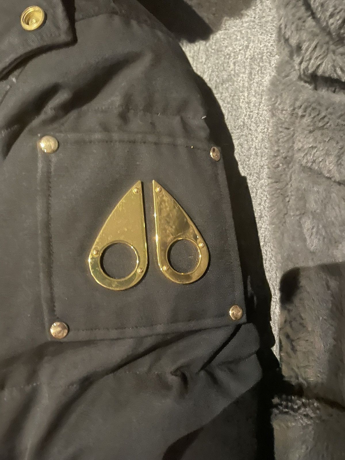 Moose Knuckles Black and gold fur moose knuckle coat | Grailed