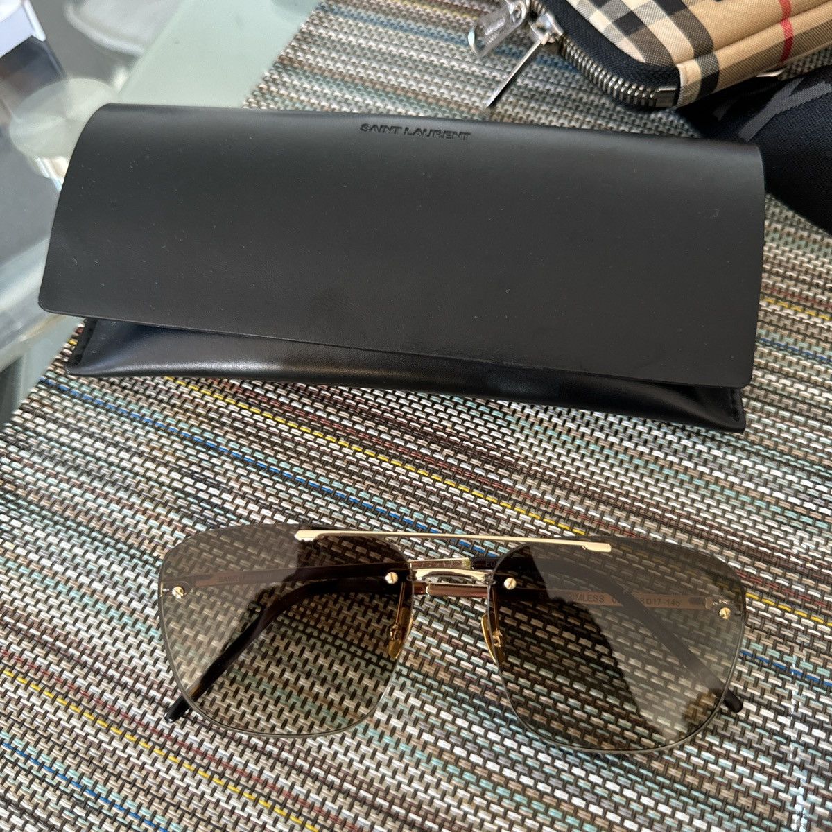 Saint Laurent Paris Saint Laurent SL 309 rimless sunglasses | Grailed