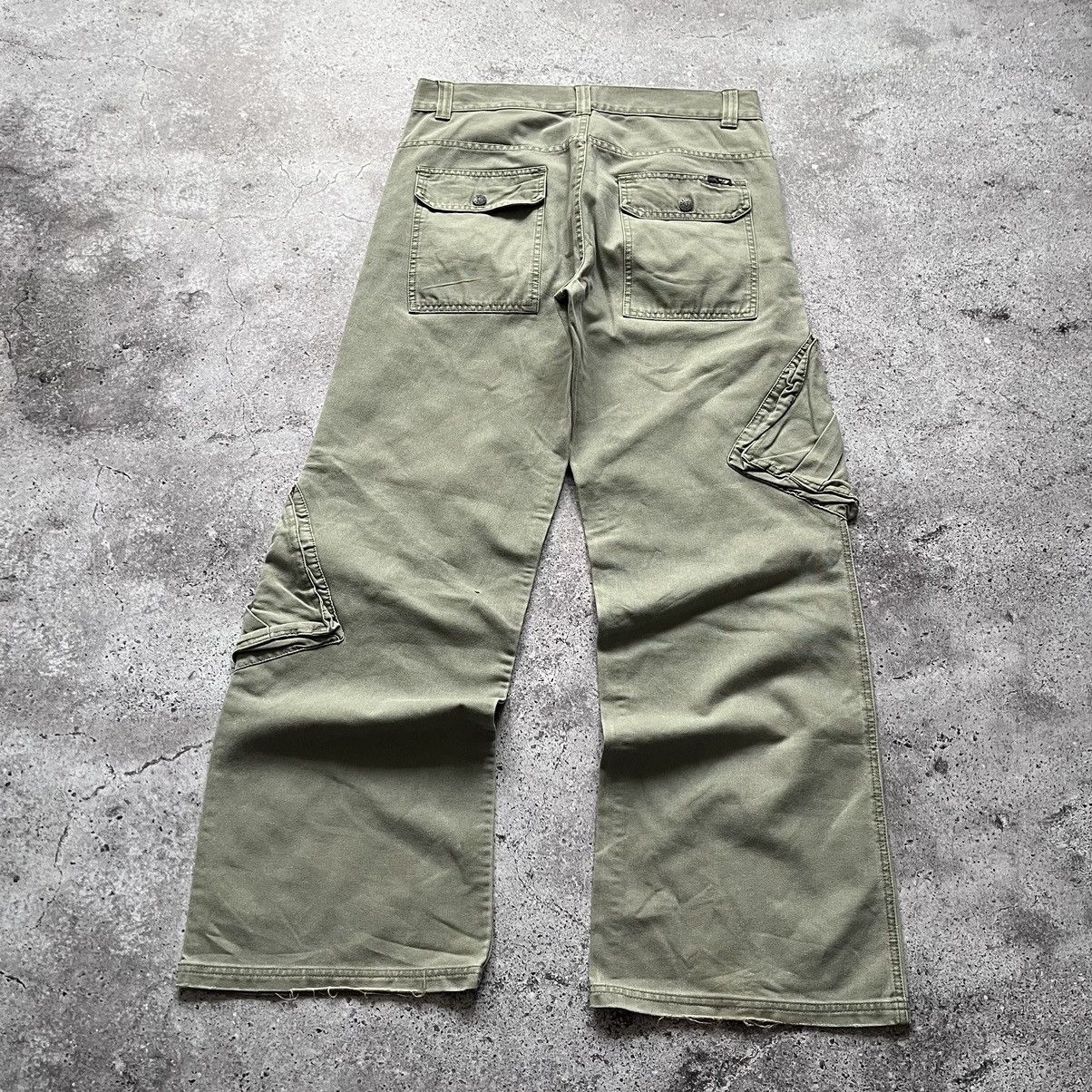 Vintage Flared cargo pants opium | Grailed