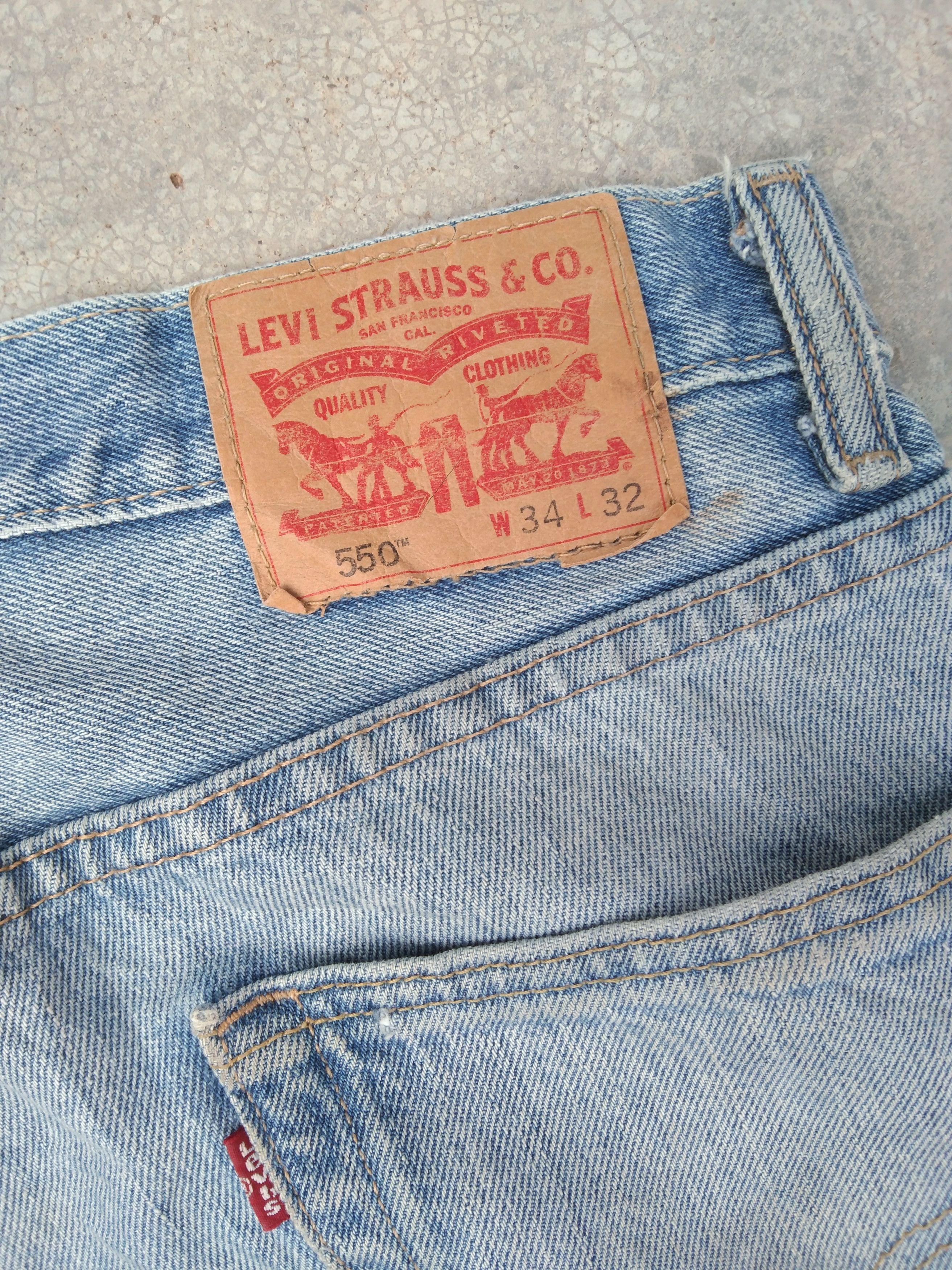 Levi's Vintage Levi's Jeans 550 Dirty Blue Distressed Denim 34x30 | Grailed