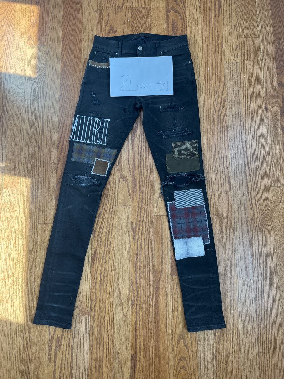 Amiri Mike Amiri patch jeans | Grailed