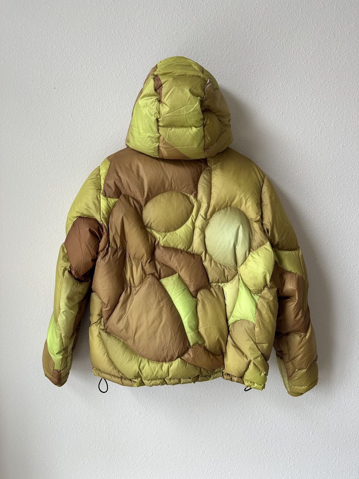 Kidsuper Studios Kidsuper Kissing Puffer Jacket Gold | Grailed