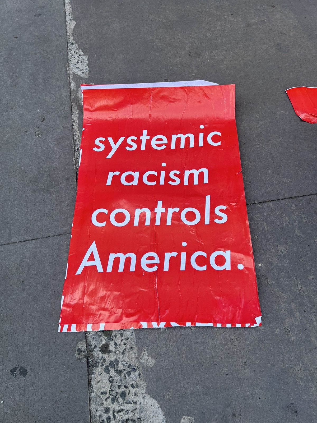 DENIM TEARS Systemic racism controls America poster | Grailed