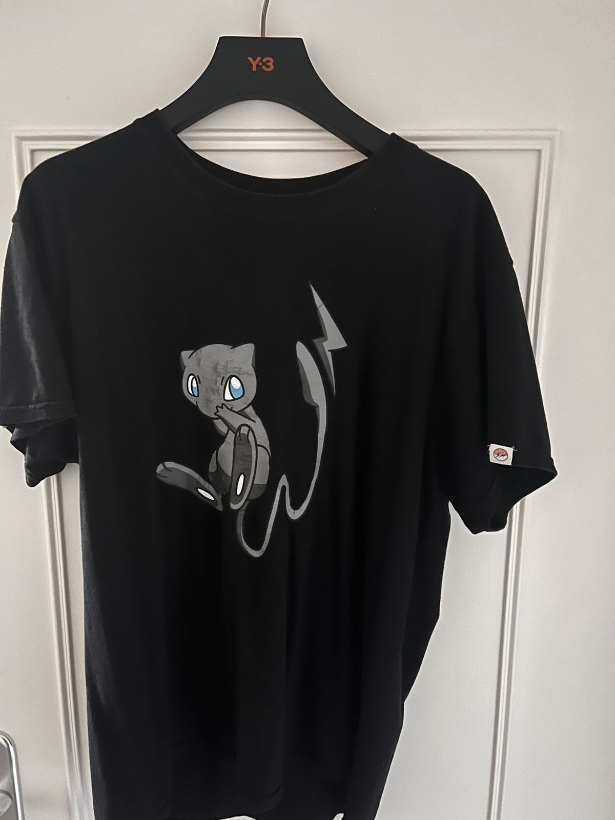 Hiroshi Fujiwara × Pokemon Thunderbolt Project Mew T-Shirt | Grailed