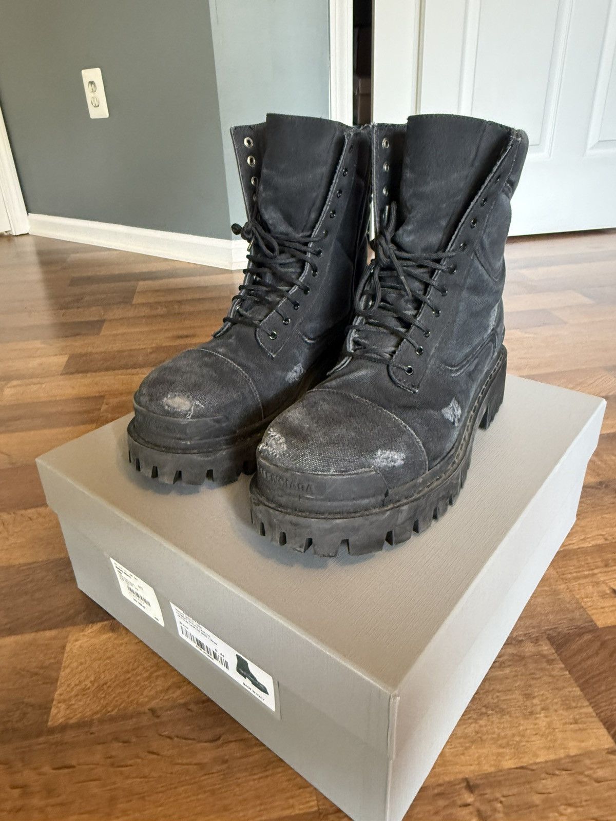 Balenciaga Balenciaga distressed combat strike boots | Grailed
