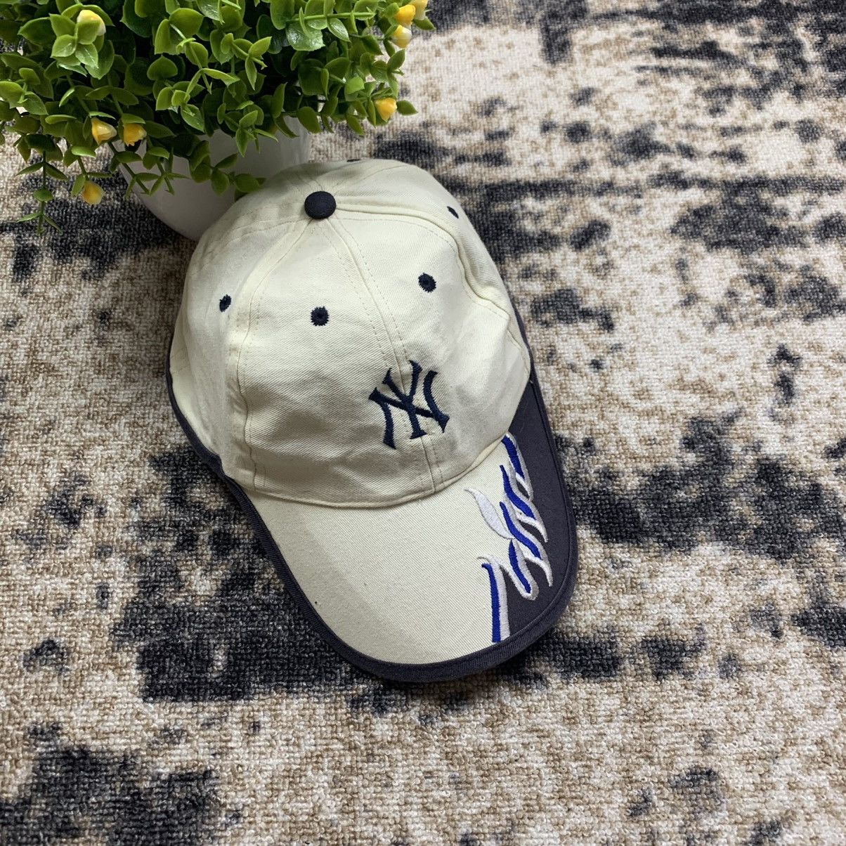 Vintage VINTAGE Y2K NEW ERA FLAME EMBROIDERED LOGO TRUCKER CAP | Grailed