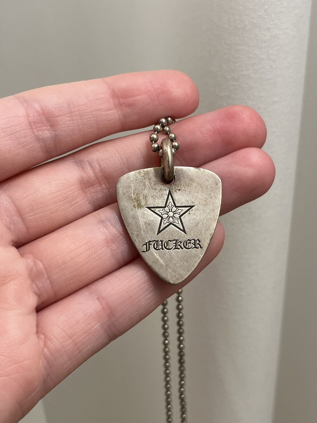 Chrome Hearts Chrome hearts guitar pick necklace | Grailed