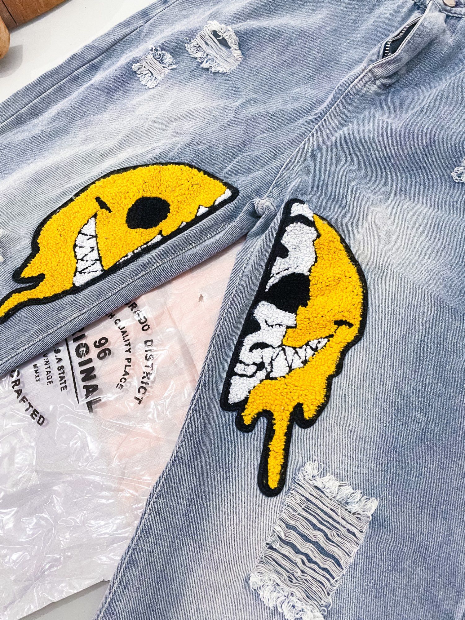 Designer × Japanese Brand × Streetwear ripped jeans with smiley | Grailed