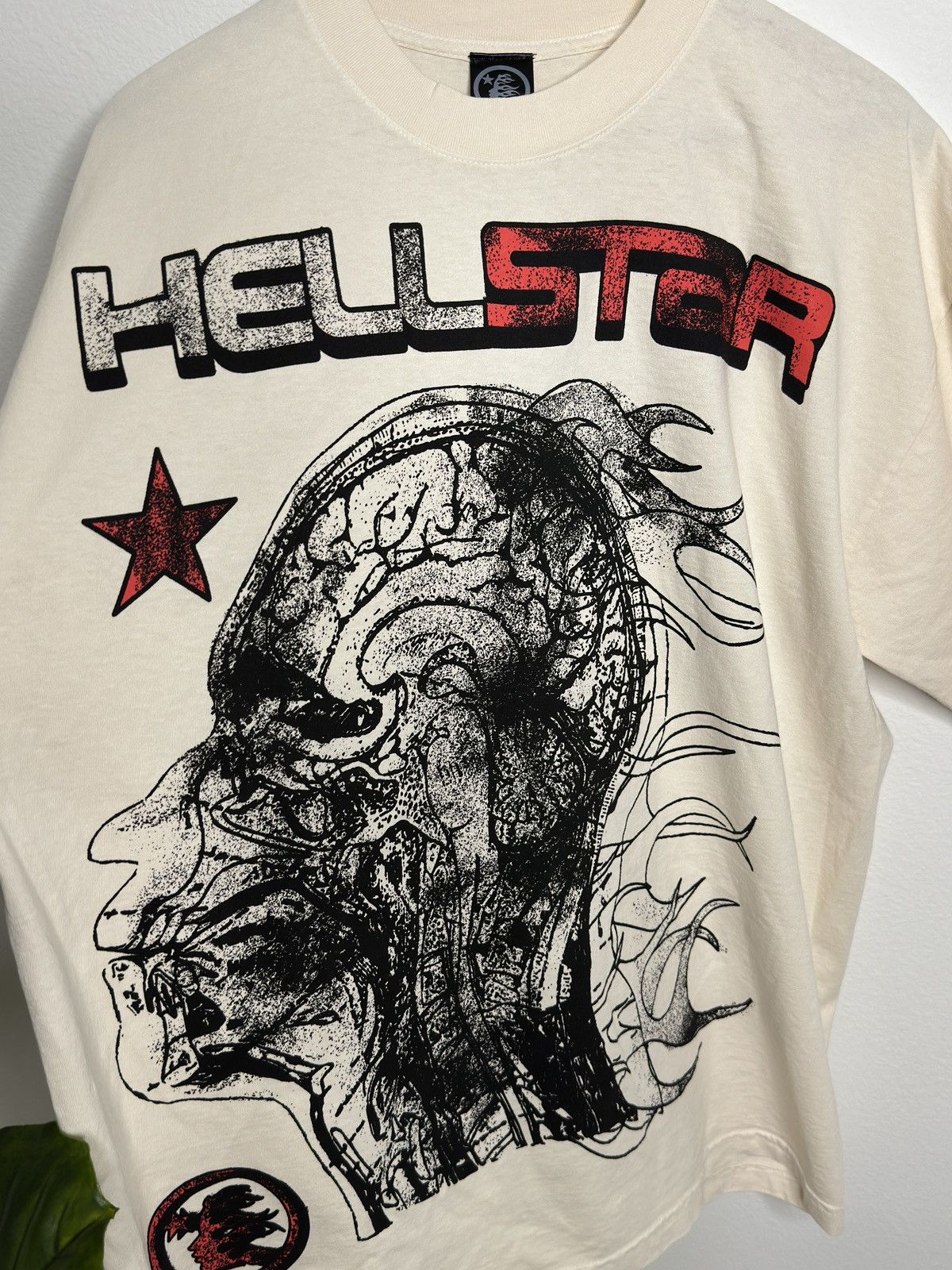 HELLSTAR Hellstar Studios Human Development Tee Cream | Grailed