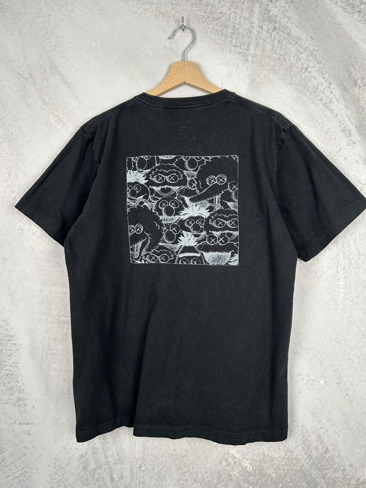 Kaws × Uniqlo Uniqlo x Kaws Graphic Tee Sesame Street Pocket Streetwear ...