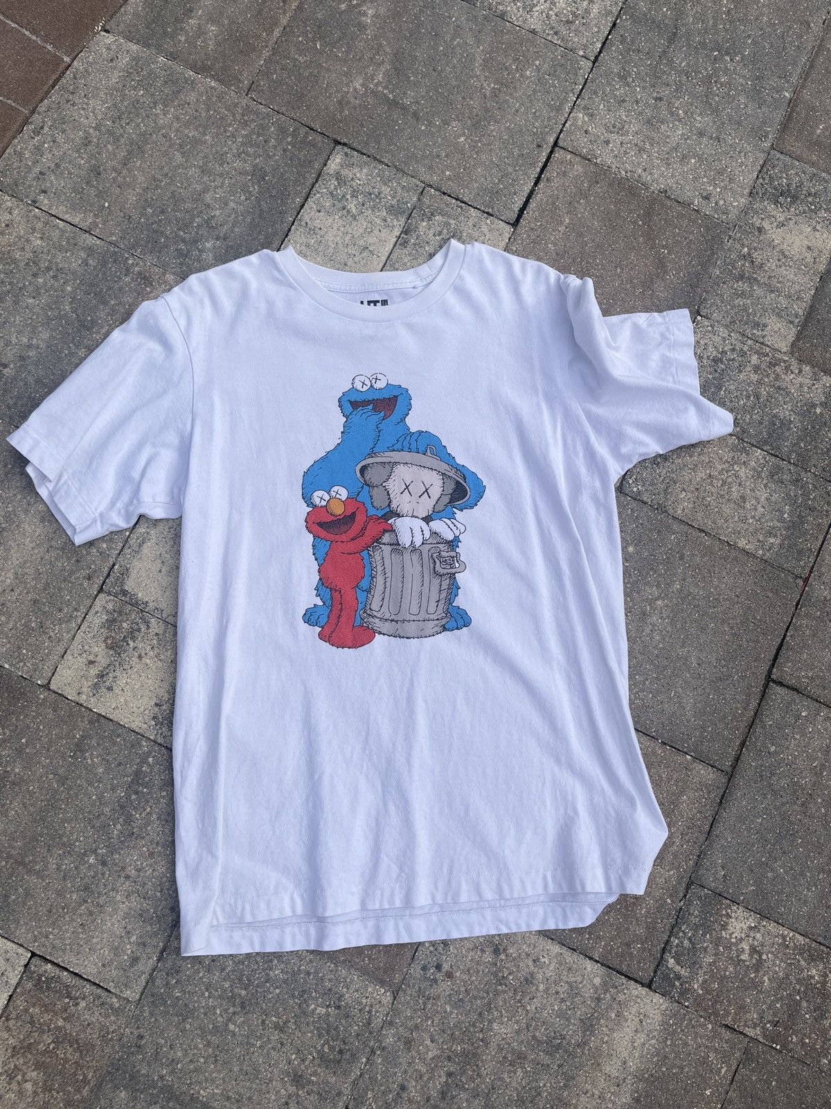 Uniqlo Kaws Sesame Street Trash Can tee | Grailed
