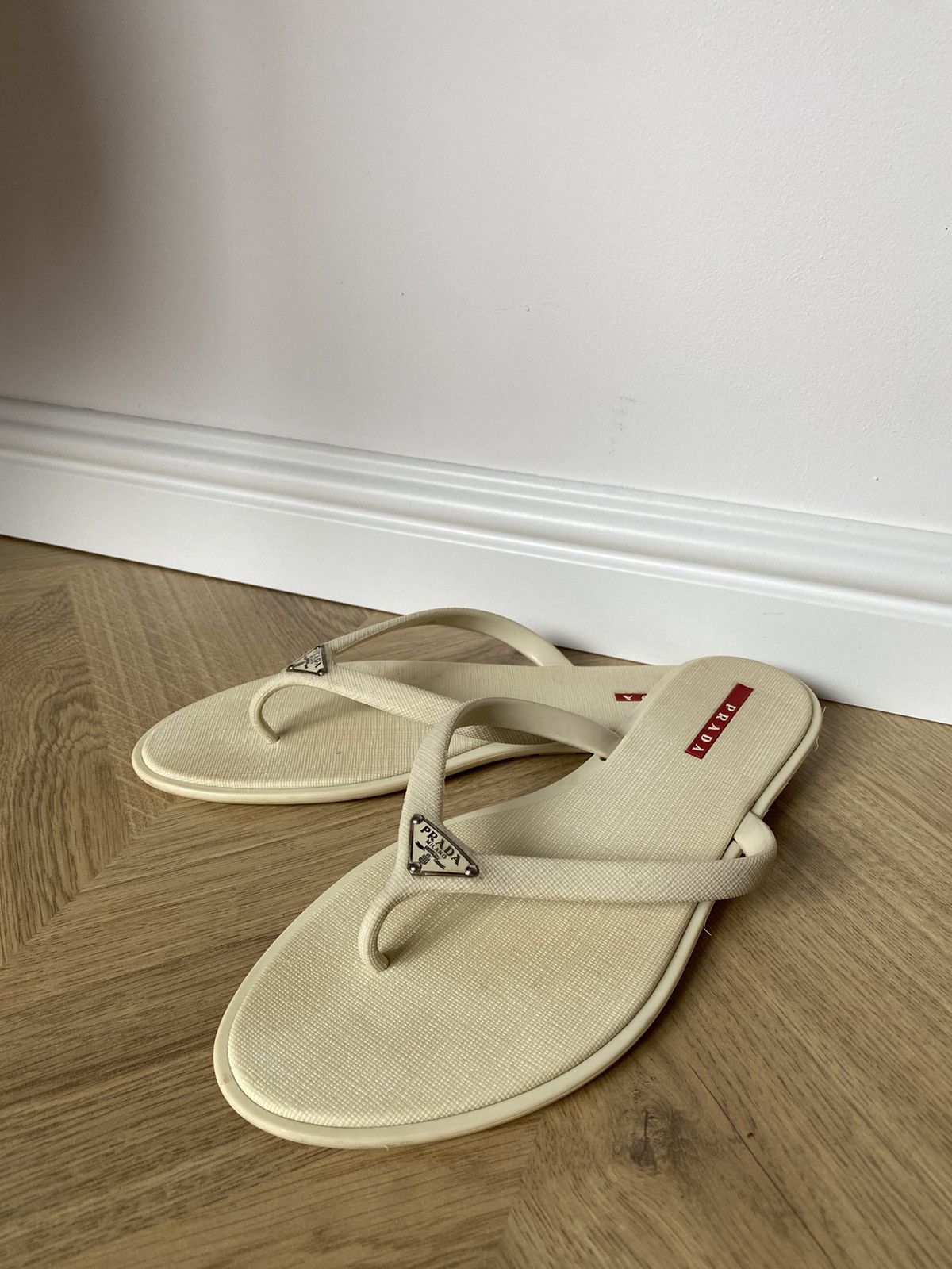 Designer × Luxury × Prada Prada thong flip flops rubber cream beige ...
