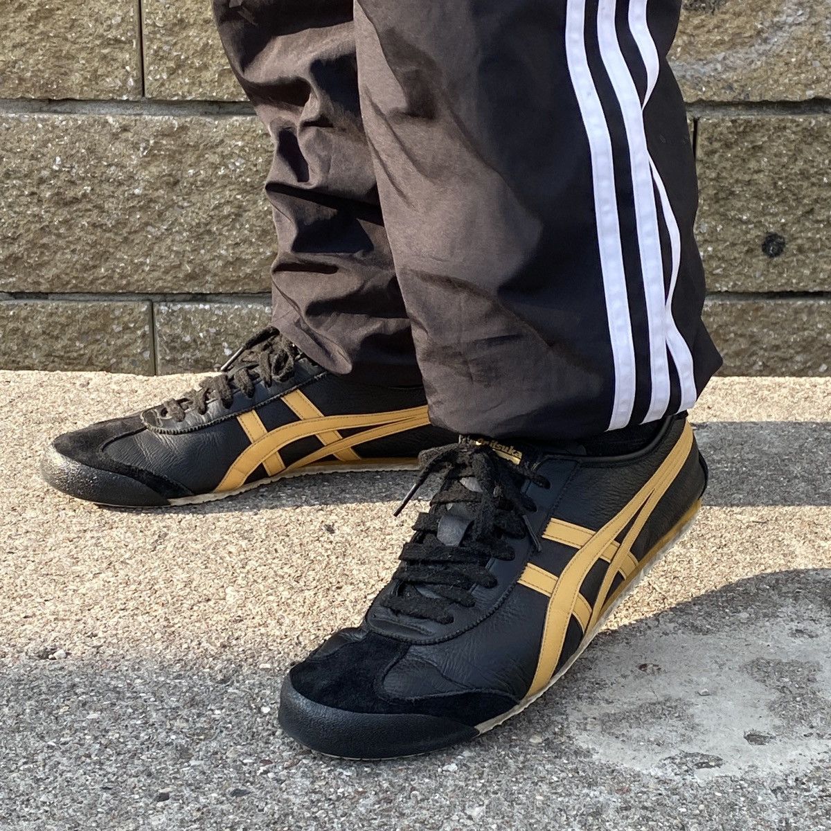 Asics Vintage Rare Onitsuka Tiger black yellow leather sneakers | Grailed