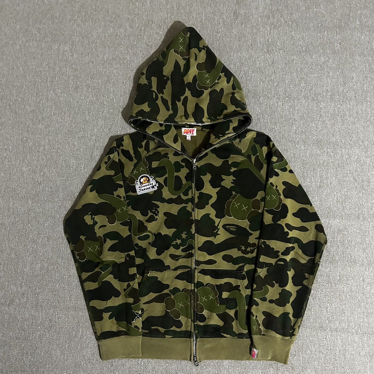 Bape × Kaws Bape x Kaws 1st Camo Bendy Full Zip Hoodie | Grailed
