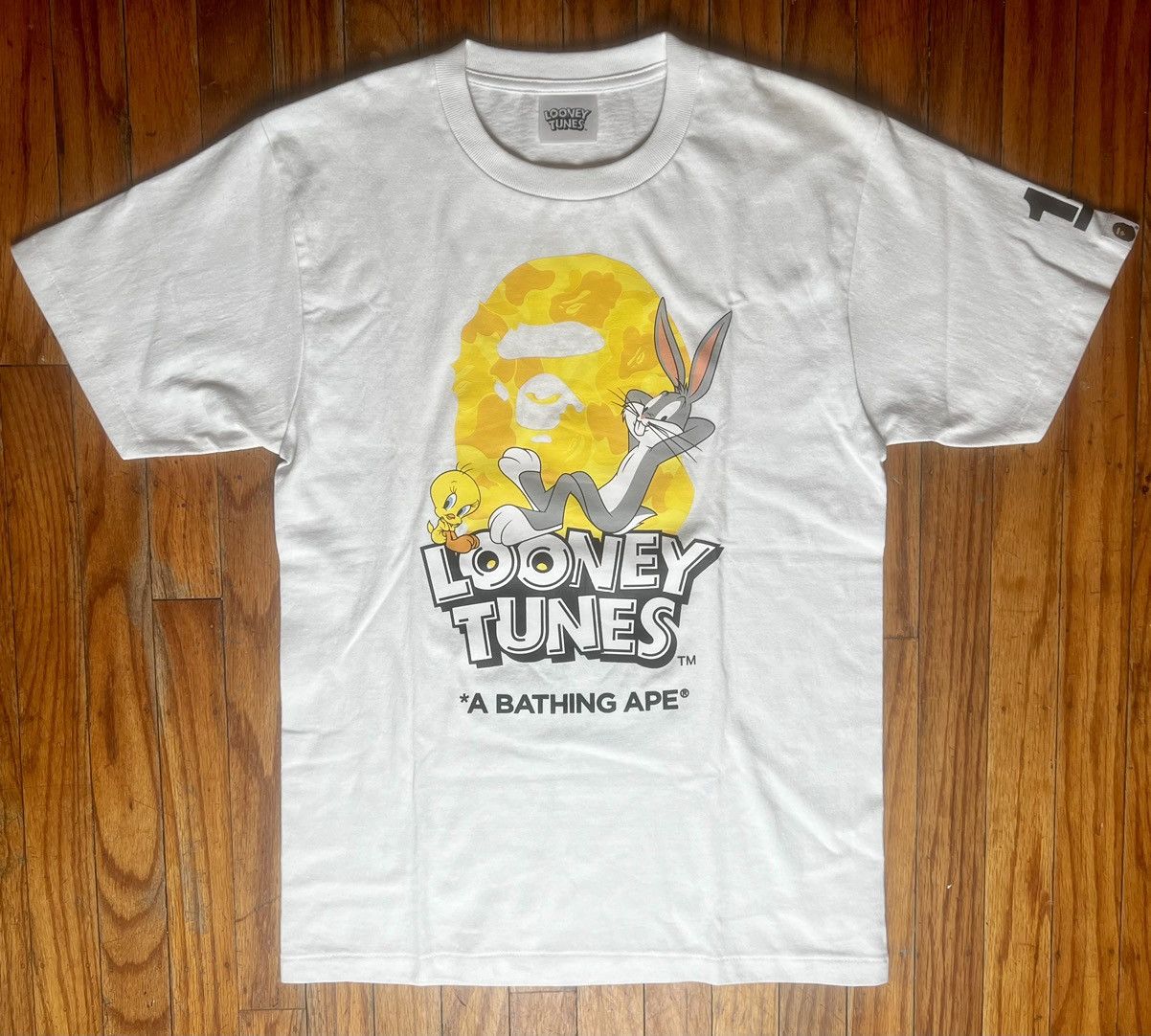 Bape × Warner Bros BAPE x LOONEY TUNES ABC CAMO APE HEAD TEE | Grailed