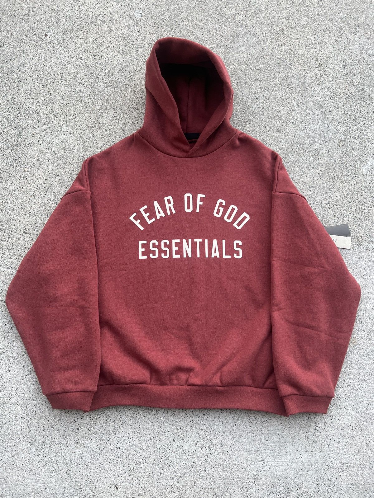 Essentials × Fear of God Crimson Fear of God Essentials Fleece Hoodie ...