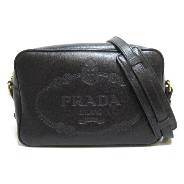 Prada Prada Leather Logo Embossed Camera Bag | Grailed