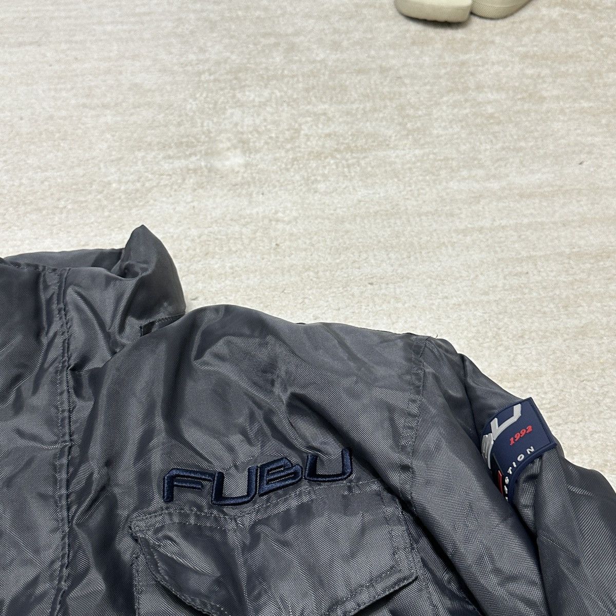 Fubu Vintage FUBU Grey Blue Down Puffer Jacket No Hood | Grailed