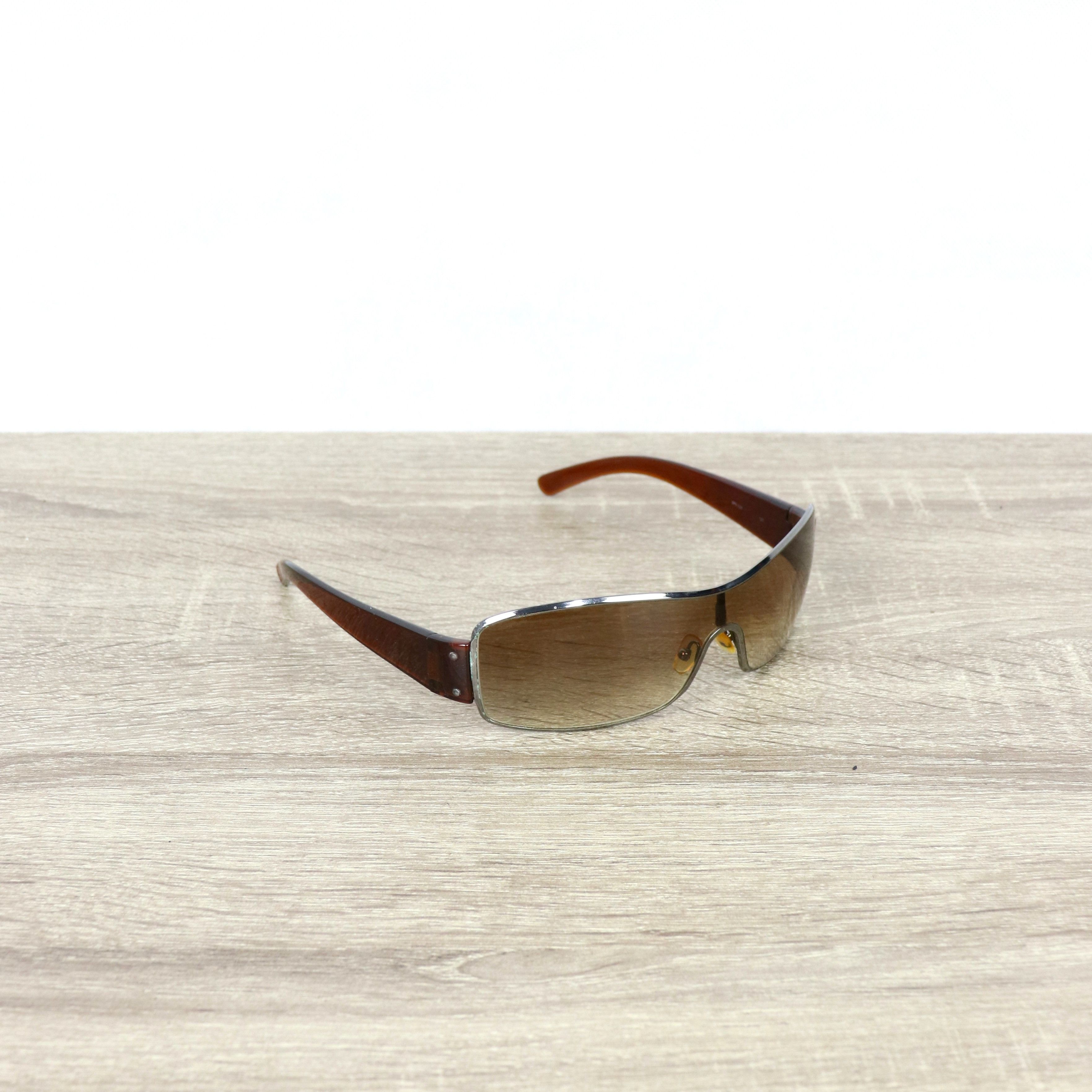 Prada Prada mask sunglasses | Grailed