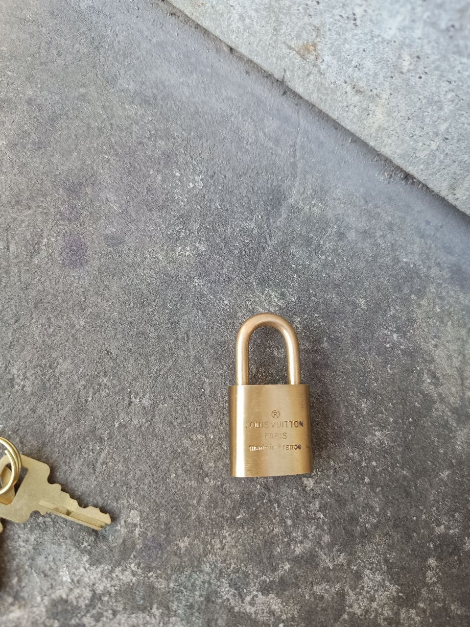 Louis Vuitton Louis Vuitton lock suspension | Grailed