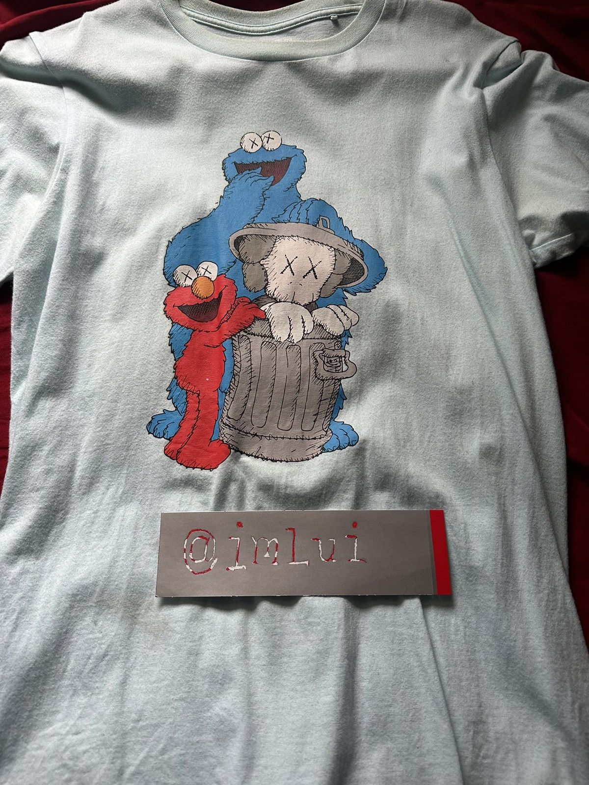 Kaws × Uniqlo Kaws x Uniqlo x Sesame Street Companion Trash Can Tee ...