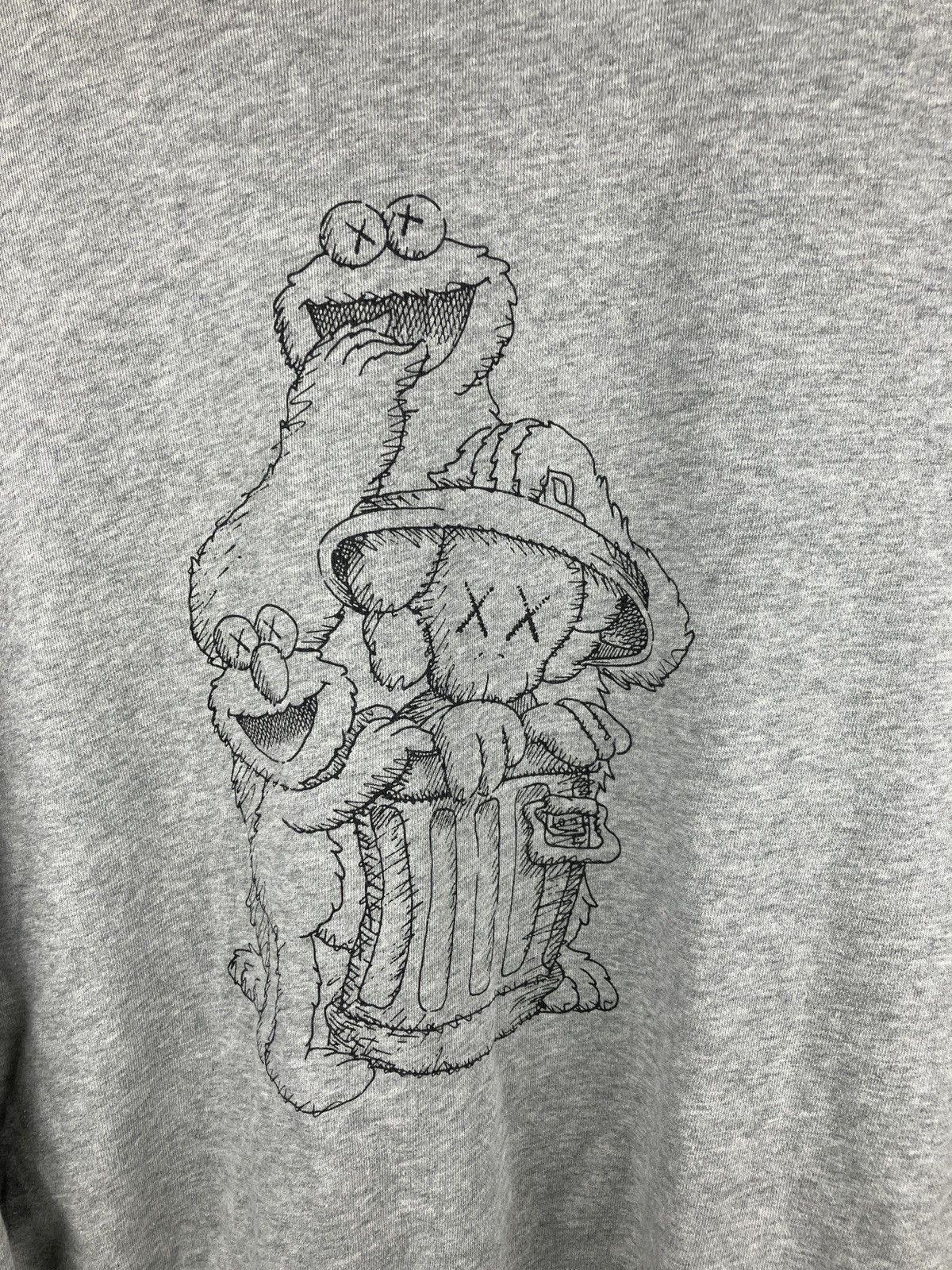Uniqlo KAWS x Uniqlo x Sesame Street Trash Can Outline Sweatshirt | Grailed