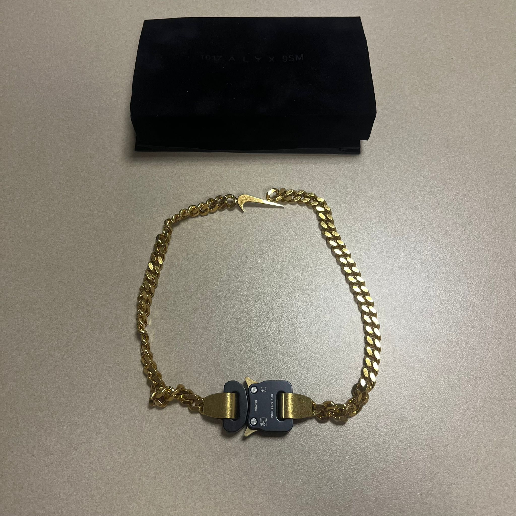 Alyx × Nike Alyx Nike Swoosh Hero Chain in Gold | Grailed