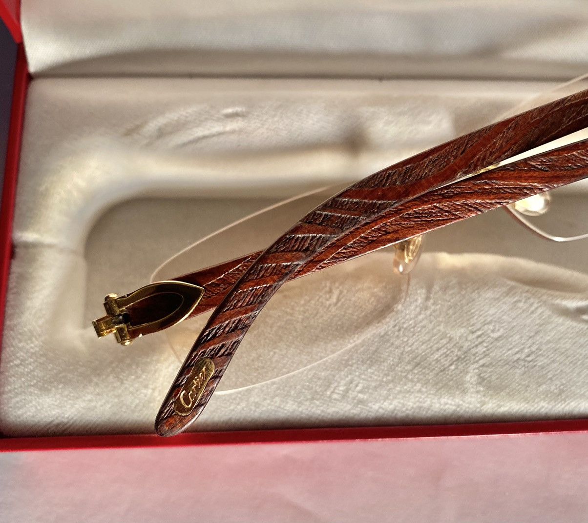 Cartier RARE 2000s CARTIER ZEBRA WOOD C DECOR GOLD RIMLESS FRAMES | Grailed