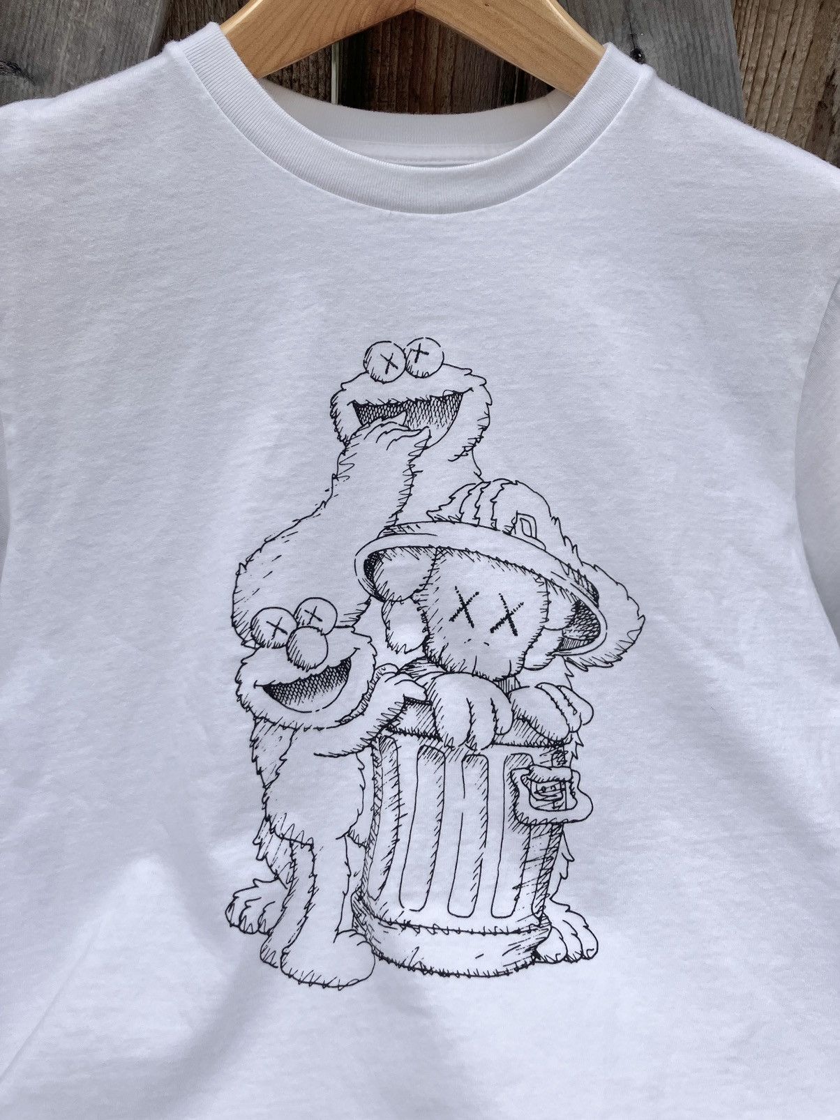 Uniqlo Kaws x Sesame Street Uniqlo Companion Trash Can Outline Tee ...