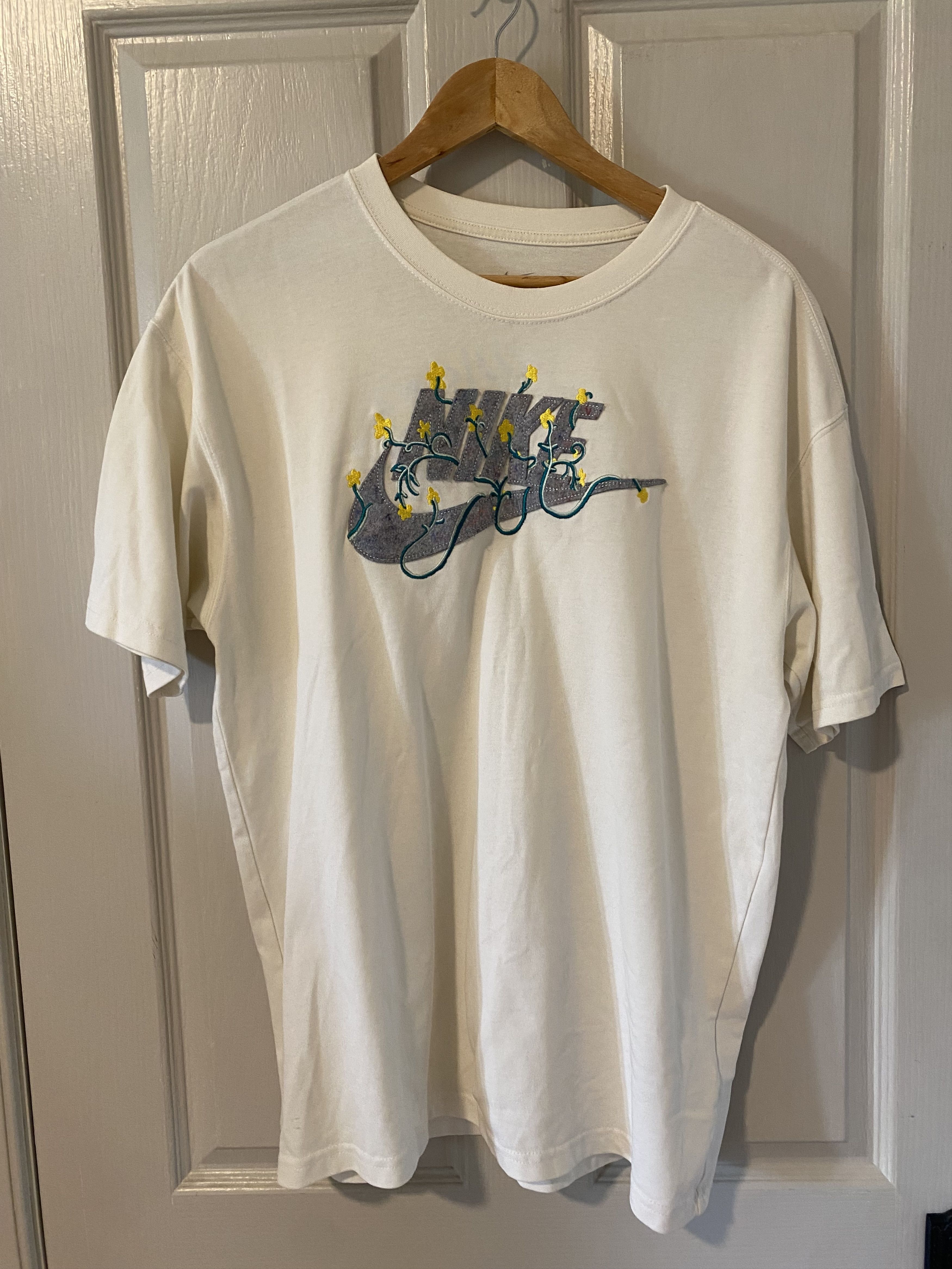 Nike Nike embroidered tick x flower t-shirt | Grailed